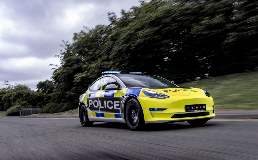 The Tesla Model 3 police car drives on British roads UK for emergency ...